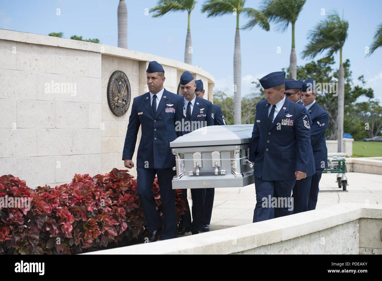 Airmen assigned to the 156th Airlift Wing carry the casket of Master ...