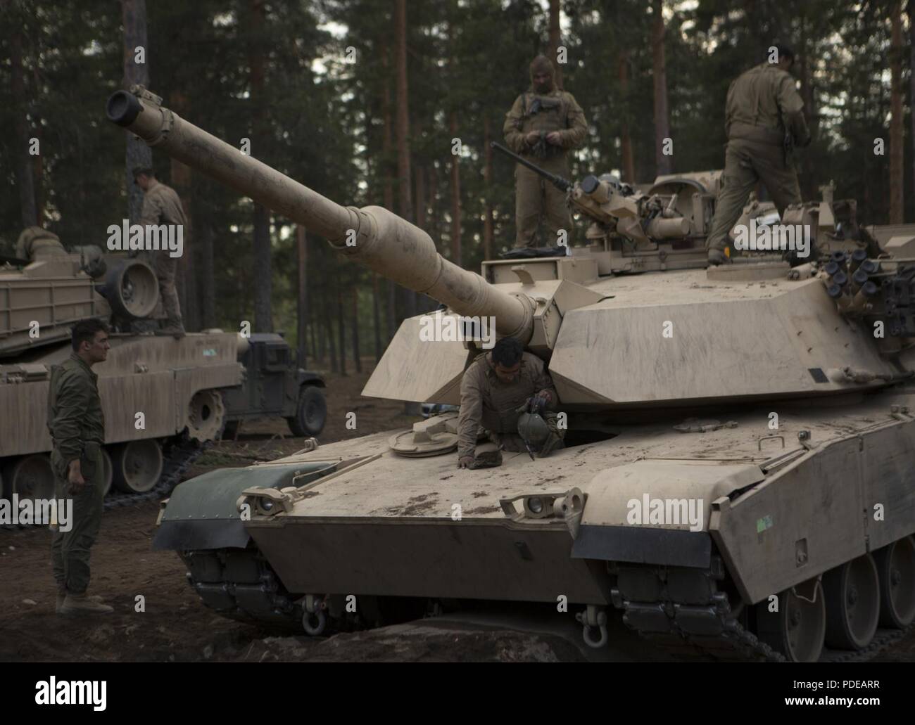 Marines with Bravo Company, 4th Tanks Battalion, prepare their M1A1 ...