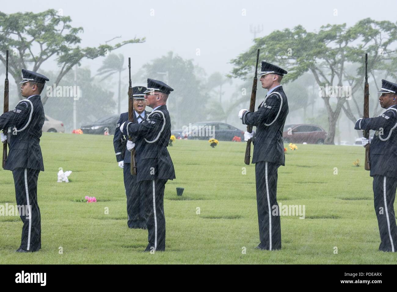 U.S. Air Force riflemen render a Three Volley Salute, also known as a ...