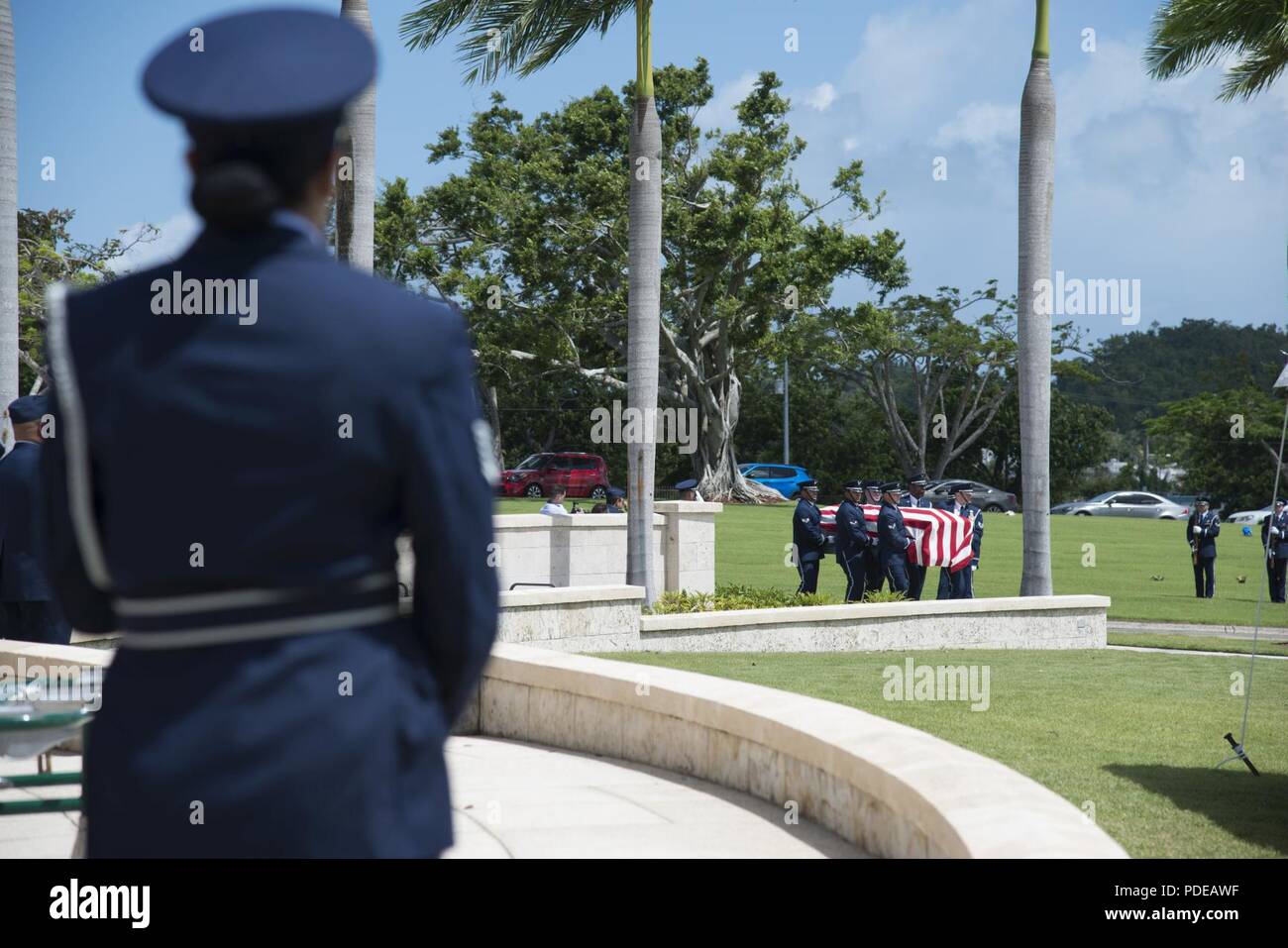 Airmen assigned to the U.S. Air Force Honor Guard transport the casket ...