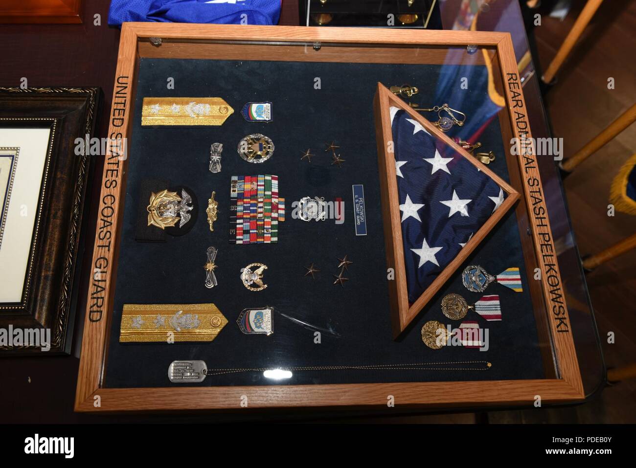 A shadow box reflecting U.S. Coast Guard Reserve Rear Adm. Francis ...