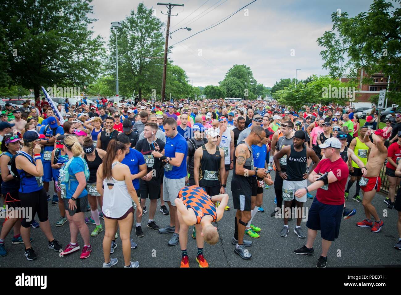 Participants strech prior to running the 11th Annual Marine Corps ...
