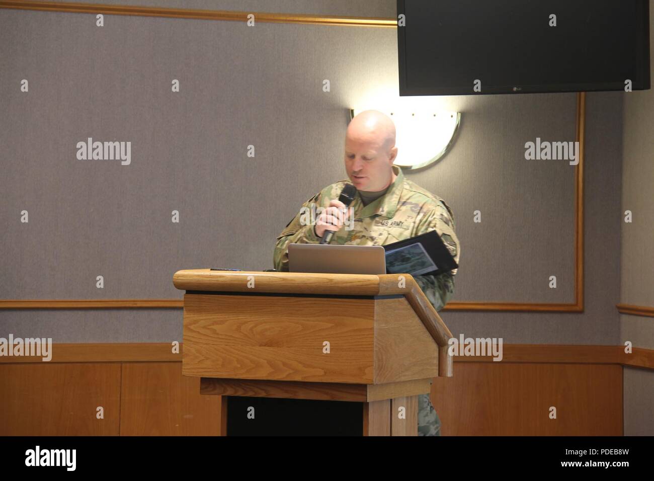 Chaplain (Lt. Col.) Leach gives the invocation at the Asian-American ...