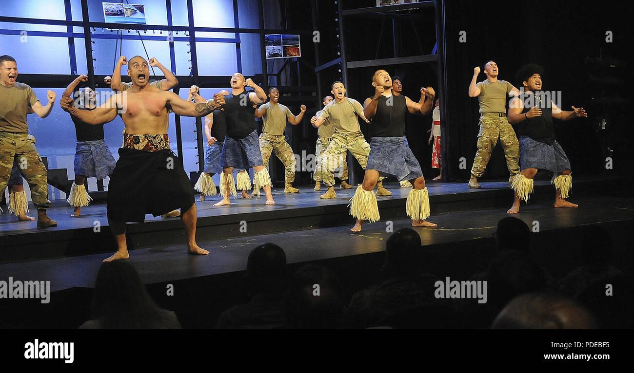 Using intimidating screams, whoops and howls, members of the Island ...