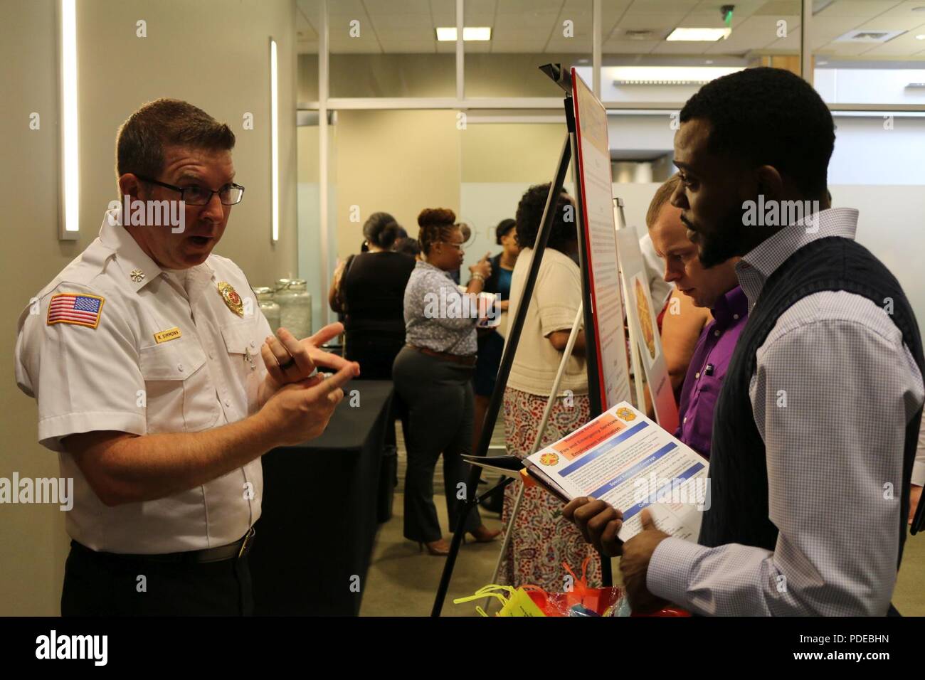 Robert Simmons, Deputy Fire Chief Redstone Arsenal, speaks with recent ...