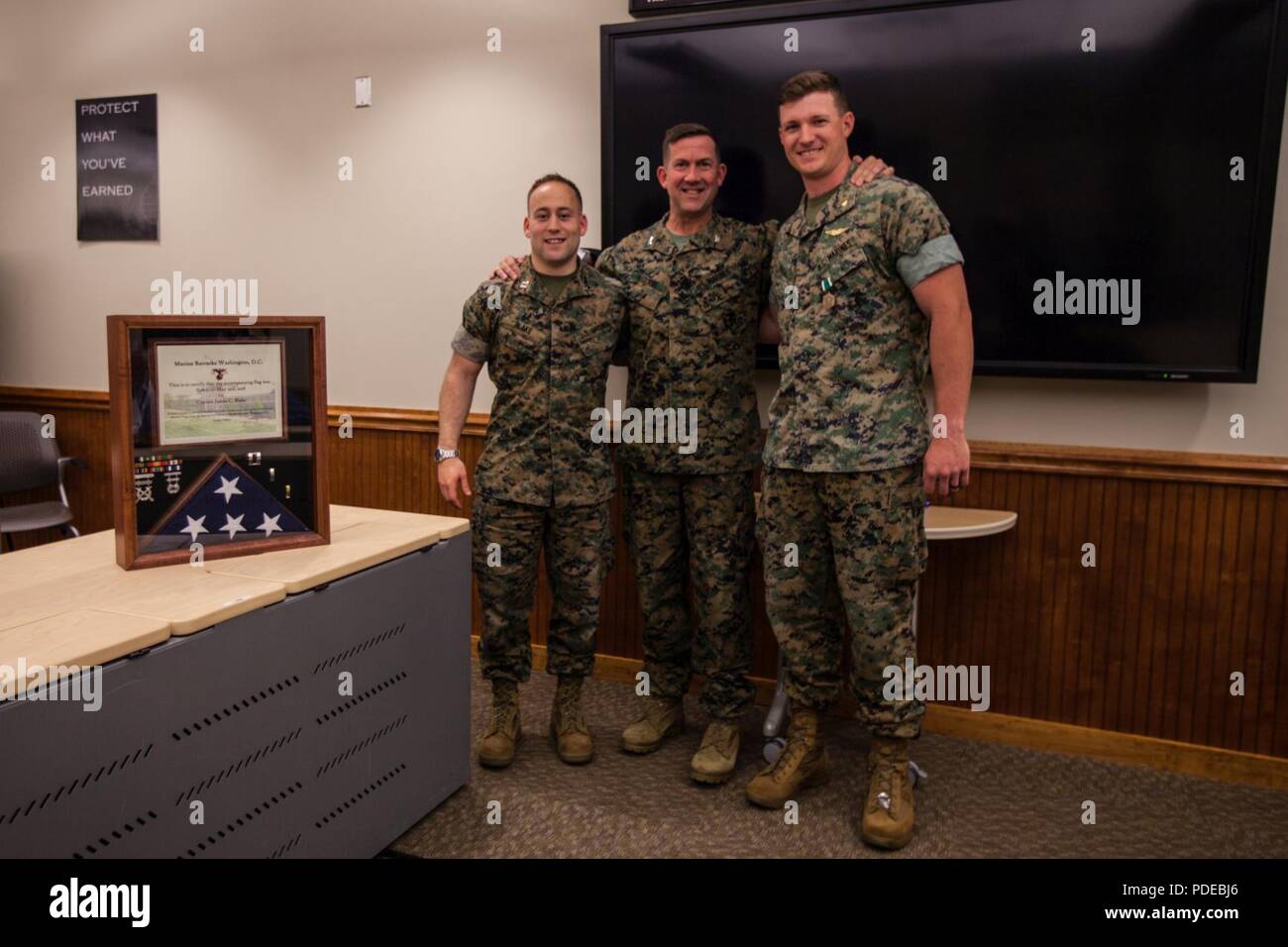U.S. Marines Maj Robert Benda and Capt James Blake pose for a Stock ...
