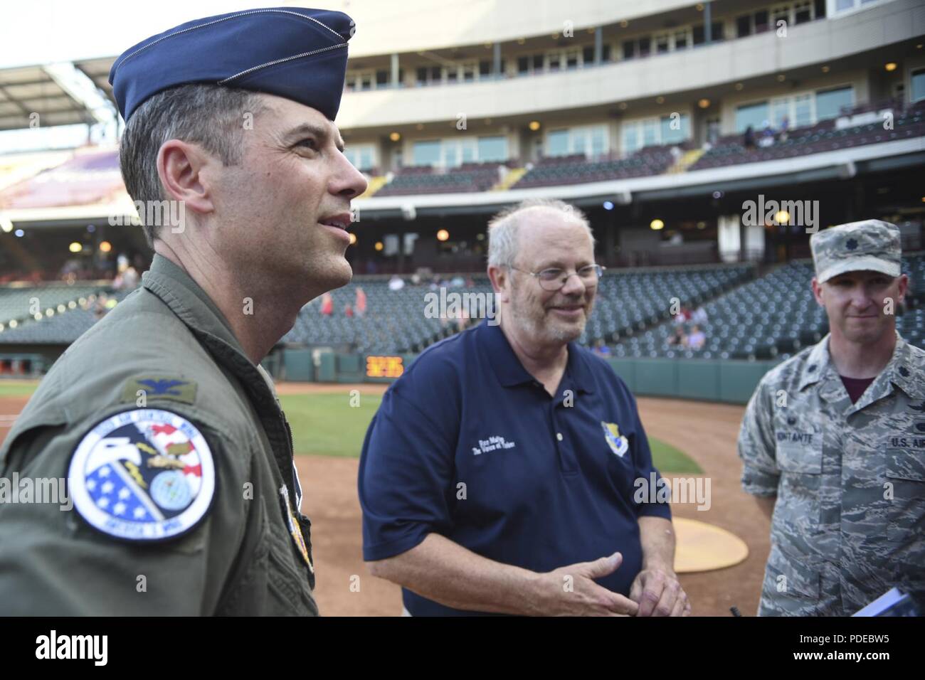 Col. Geoffrey Weiss, 552nd Air Control Wing commander, left, is joined ...