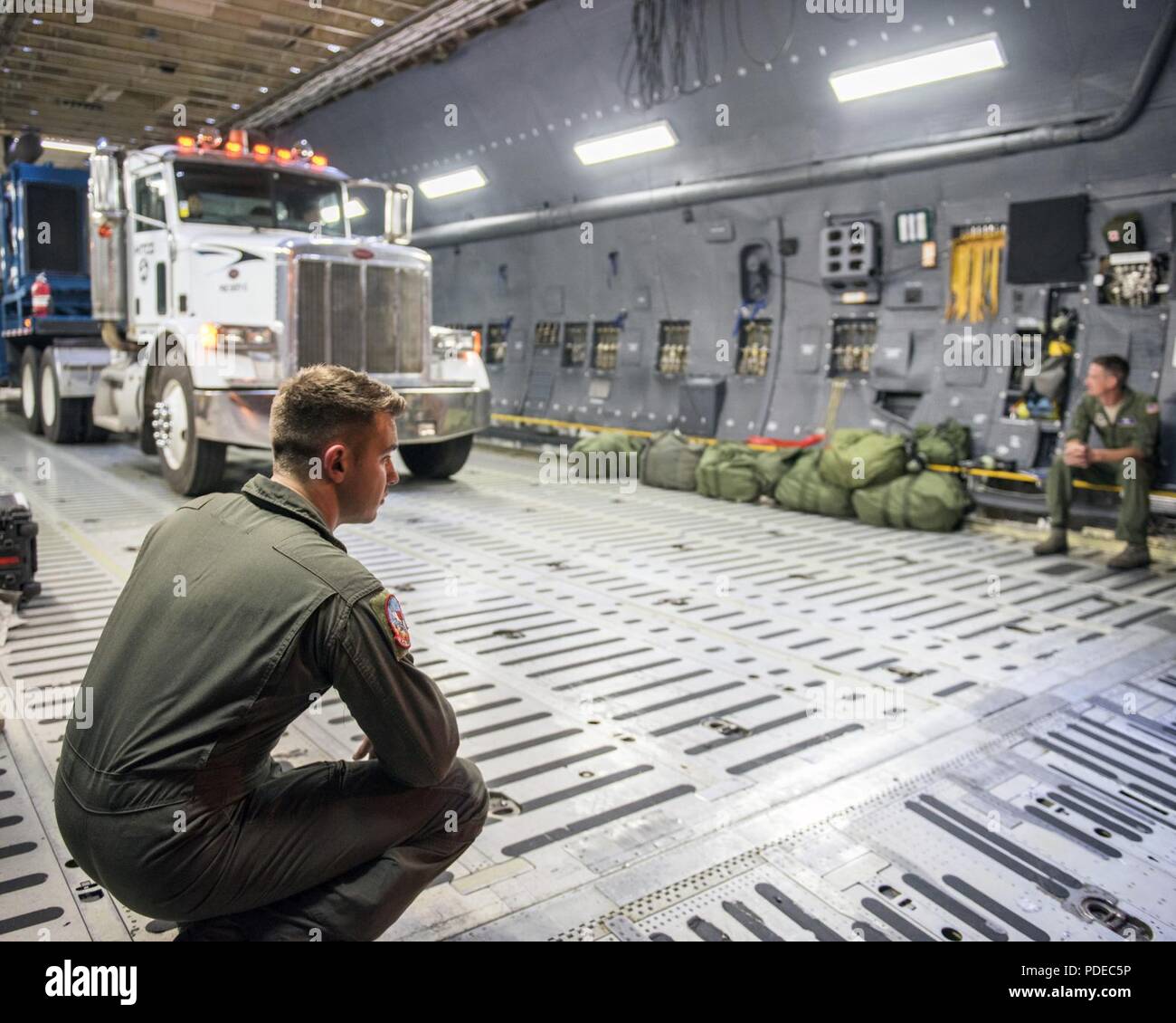Aircrew members from the 22nd Airlift Squadron, Travis Air Force Base ...