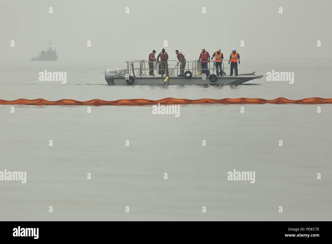 U.S. Sailors with Headquarters and Headquarters Squadron and members of ...