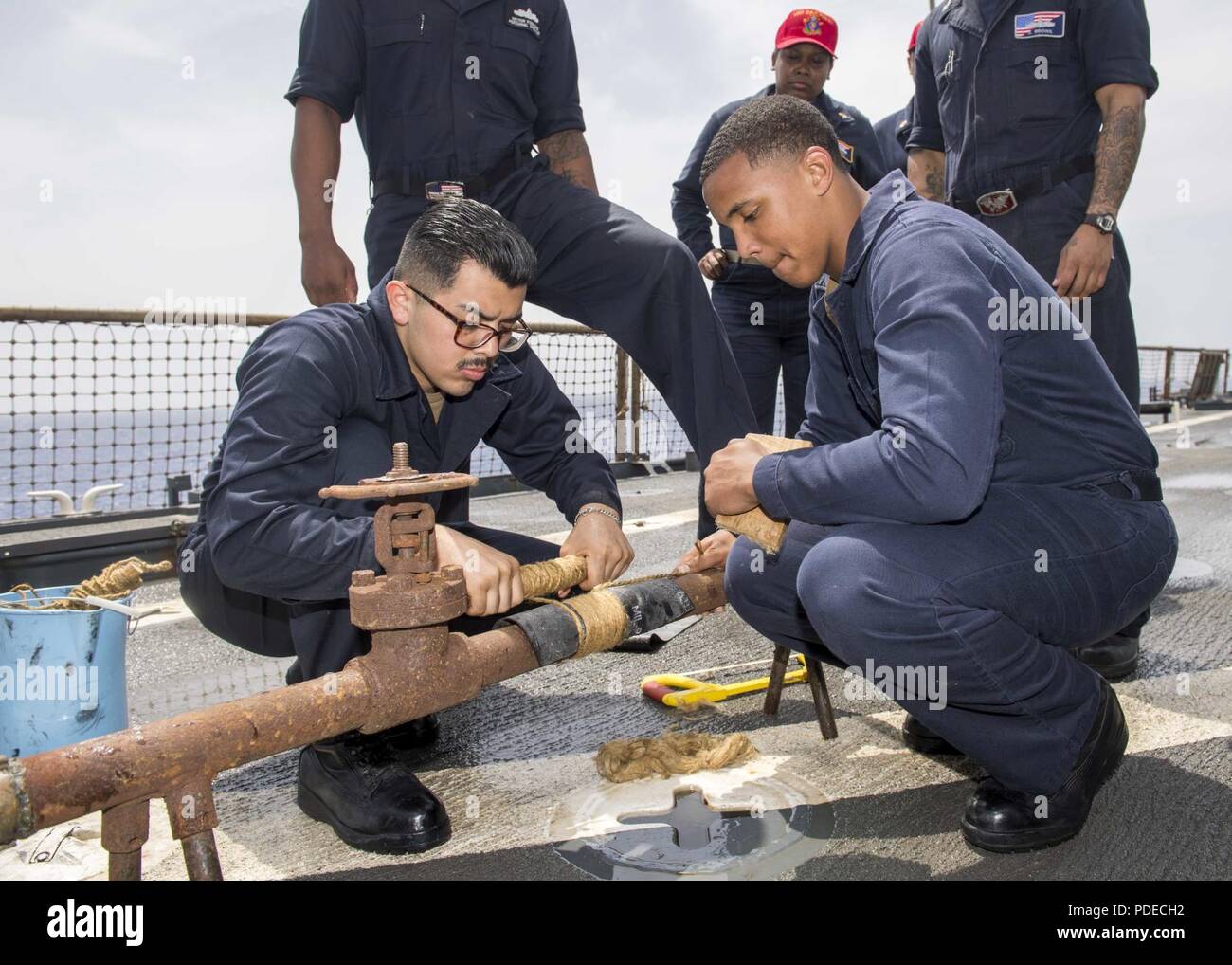 U s navy sailor uss bonhomme richard damage control training hi-res ...
