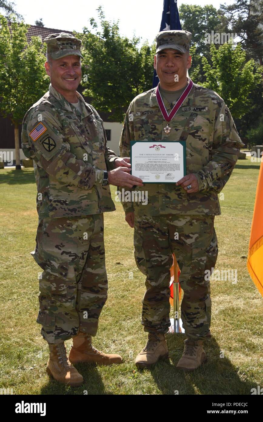 U.S. Army Lt. Gen. Christopher G. Cavoli, left, the commanding general ...