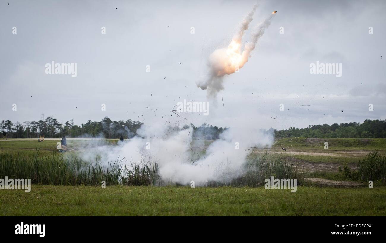 A ground burst projectile simulator C1A1 explodes during a live fire ...