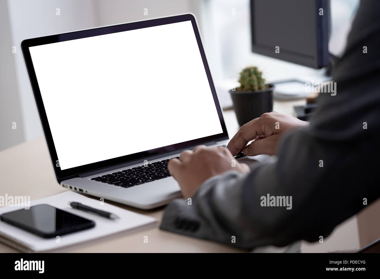 mock up Using laptop with blank screen computer modern Stock Photo - Alamy