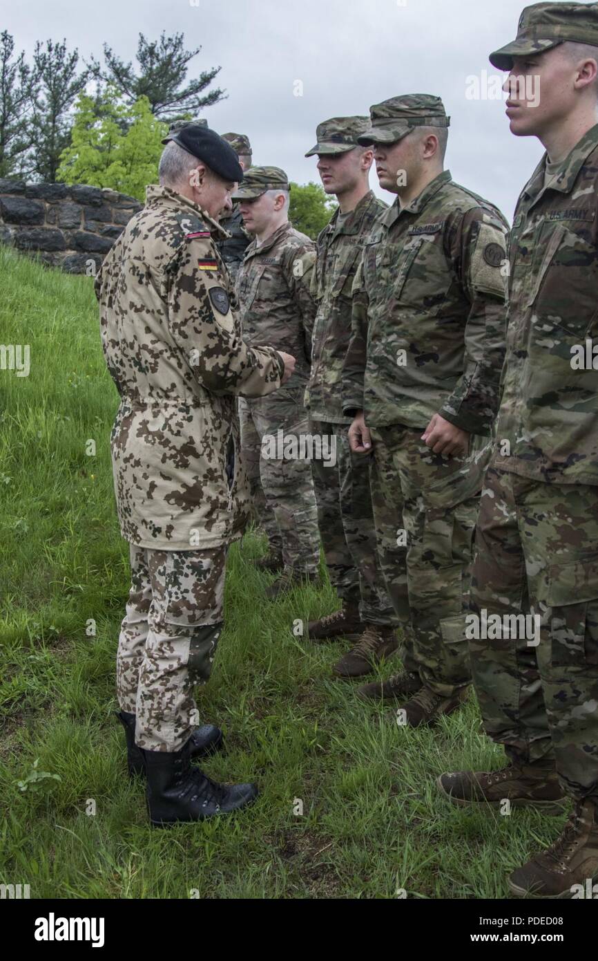 U.S. Army Sgt. David Liu, an infantryman assigned to Company B, 1-182nd ...