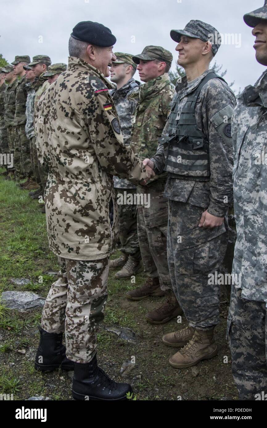 U.S. Army Spc. Ilya Titov, an infantryman assigned to Company A, 1-69th ...