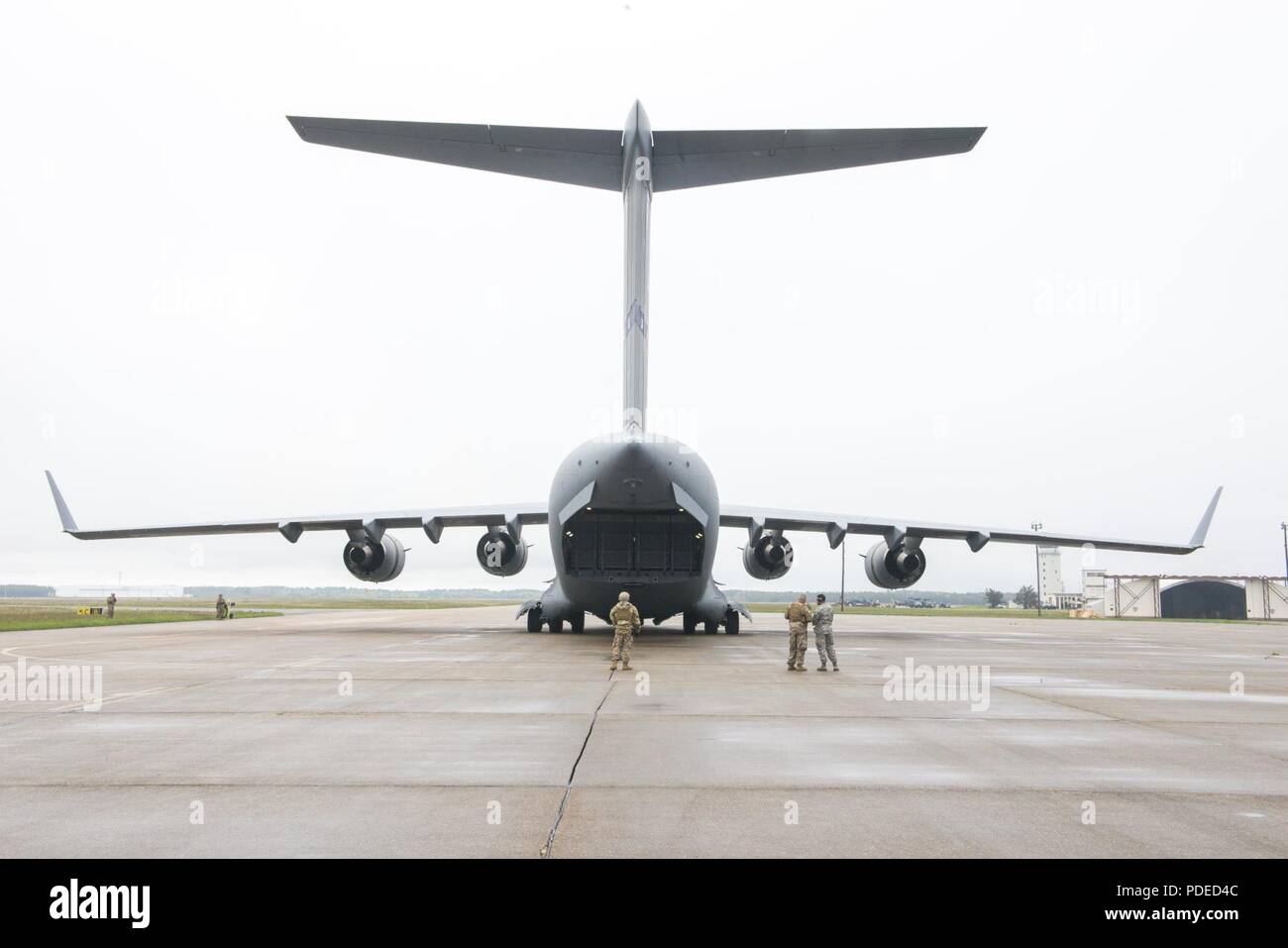 Members of the 621st Contingency Response Wing train on a C-17 aircraft ...