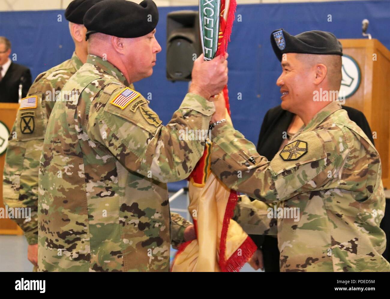 New Garrison Commander Col. Hui Chae Kim (right) passes the garrison ...