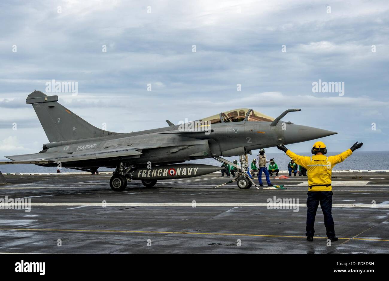 ATLANTIC OCEAN (May 14, 2018) A French sailor directs a Rafale Marine ...