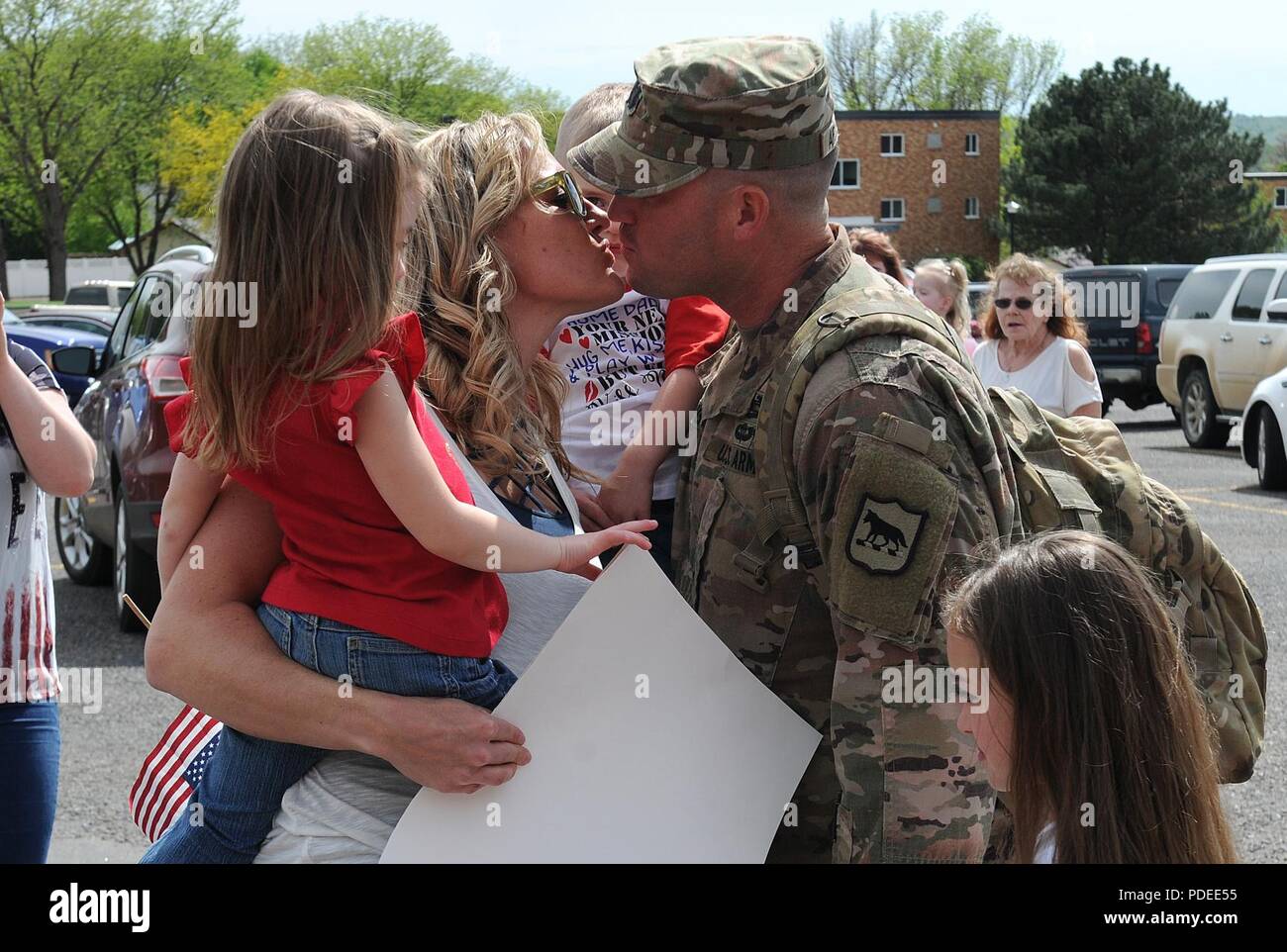 U.S. Army Capt. A.J. Armstrong is greeted by his family as 15 Soldiers ...