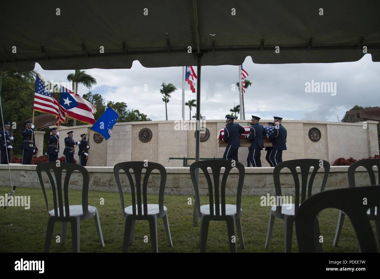 Airmen assigned to the U.S. Air Force Honor Guard transport the casket ...