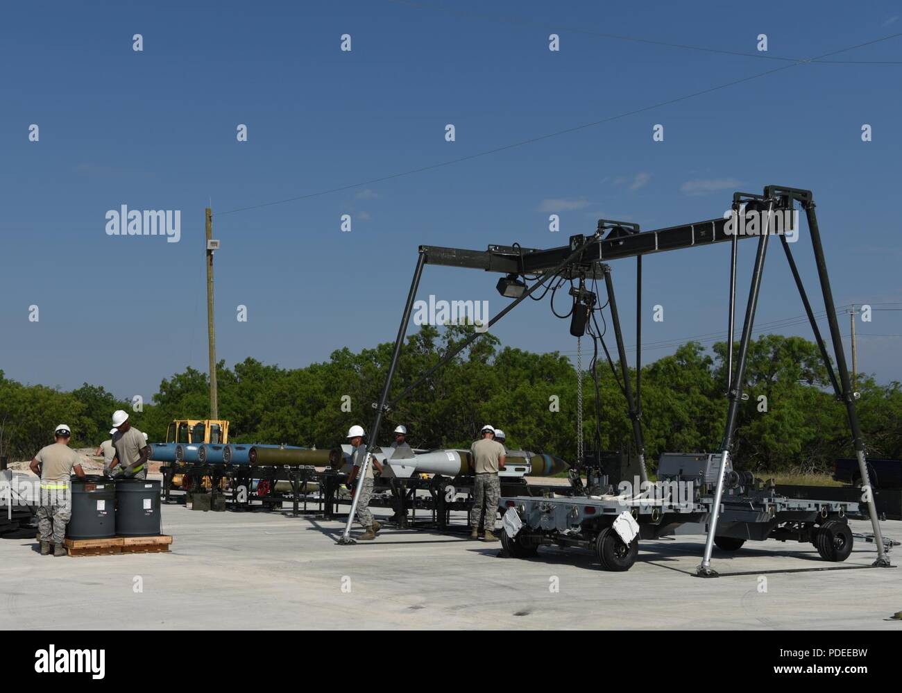 Members of the 7th Munitions Squadron participated in an inert bomb ...