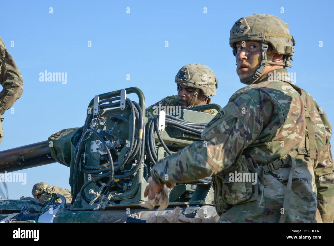 U.S. Army Paratroopers assigned to 4th Battalion, 319th Airborne Field Artillery Regiment, 173rd ...