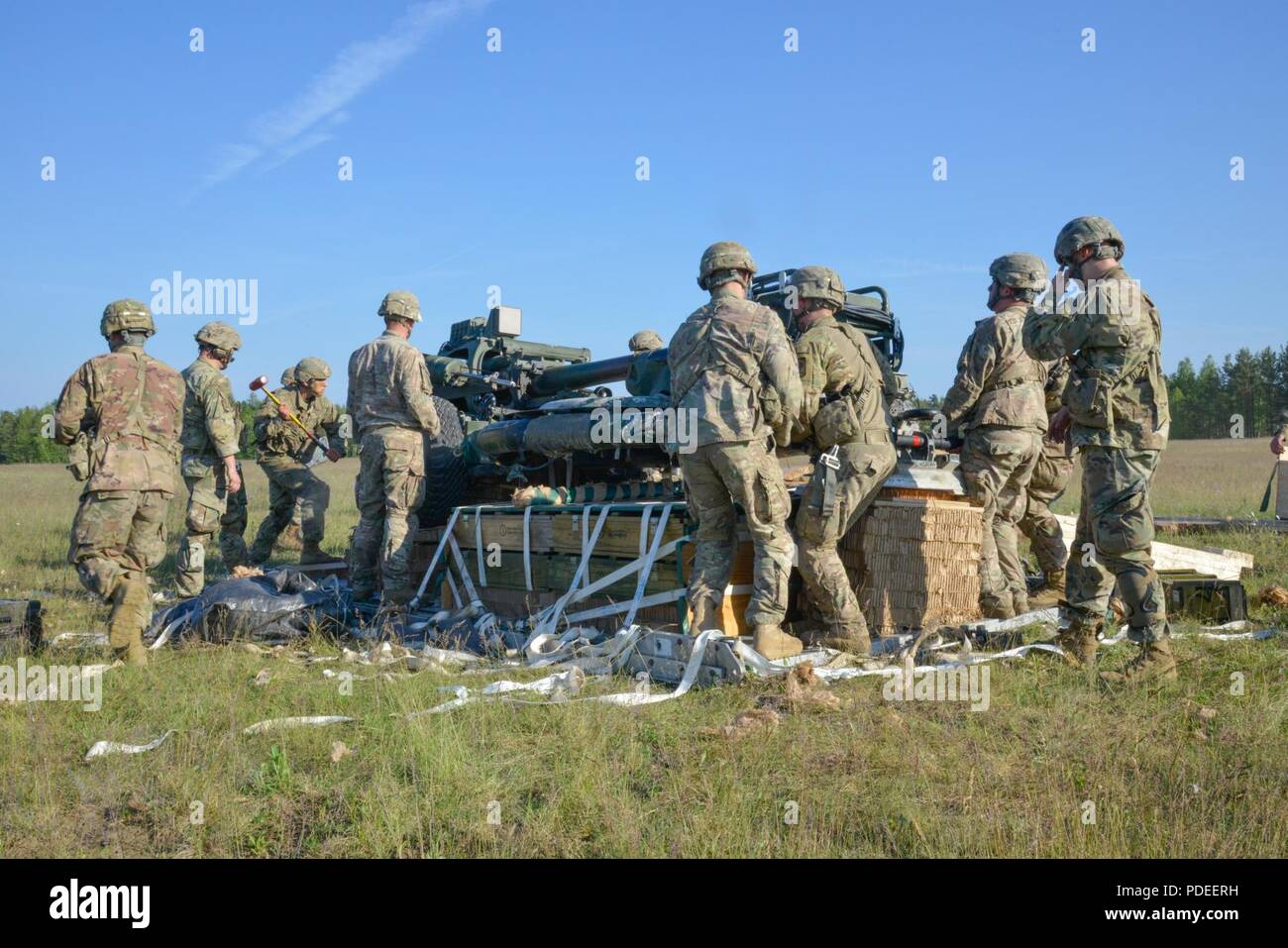 U.S. Army Paratroopers assigned to 4th Battalion, 319th Airborne Field Artillery Regiment, 173rd ...