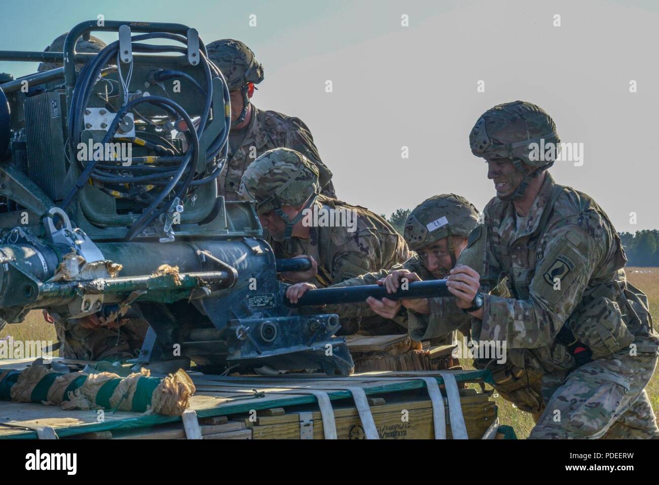 U.S. Army Paratroopers assigned to 4th Battalion, 319th Airborne Field Artillery Regiment, 173rd ...