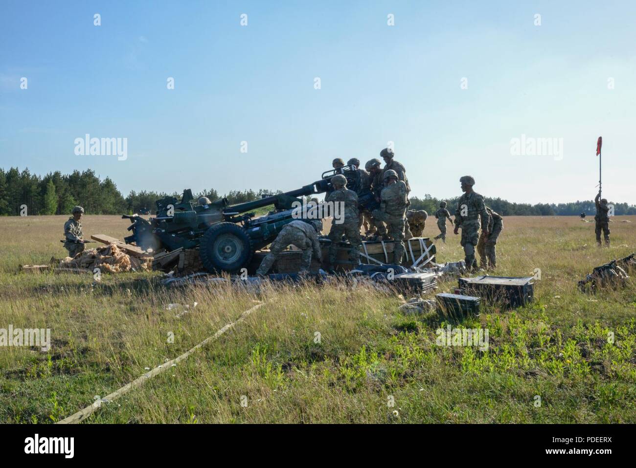 U.S. Army Paratroopers assigned to 4th Battalion, 319th Airborne Field Artillery Regiment, 173rd ...