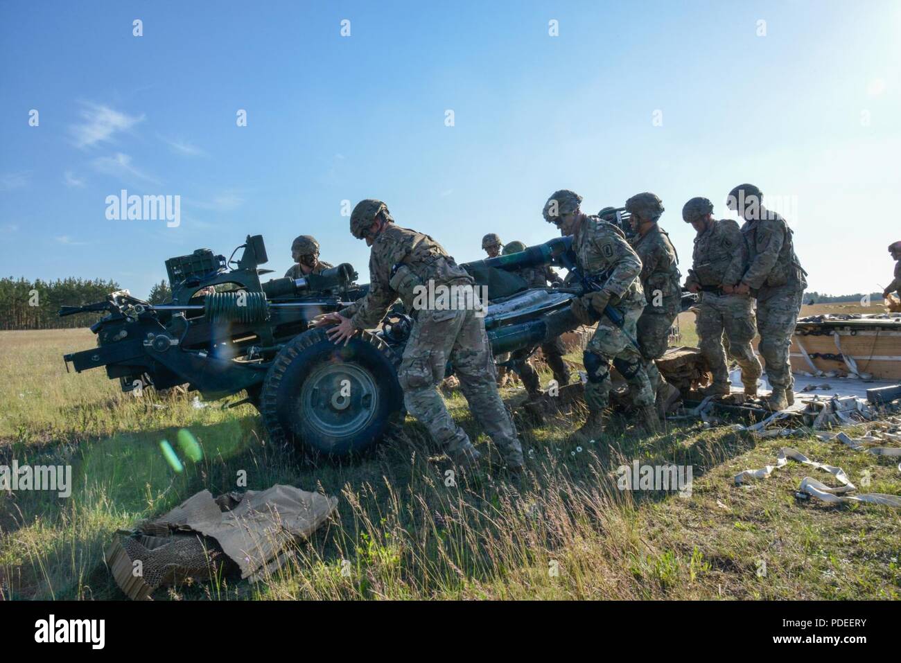 U.S. Army Paratroopers assigned to 4th Battalion, 319th Airborne Field Artillery Regiment, 173rd ...