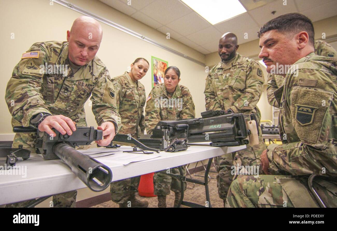 Army Reserve Sgt. 1st Class Joshua Hardman (left), division master ...