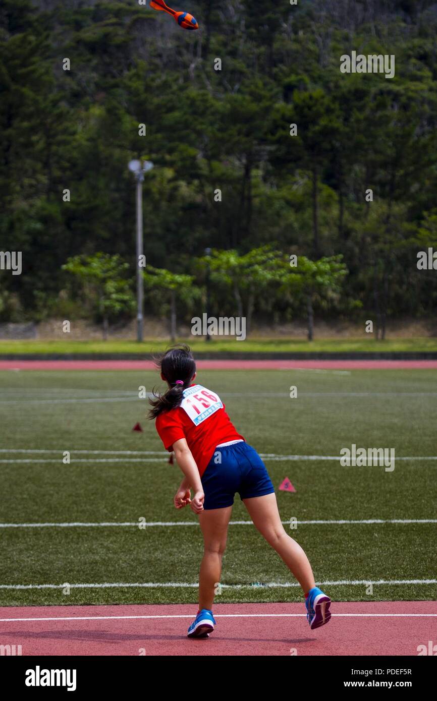 ONNA VILLAGE, OKINAWA, Japan – A child throws a vortex football during ...