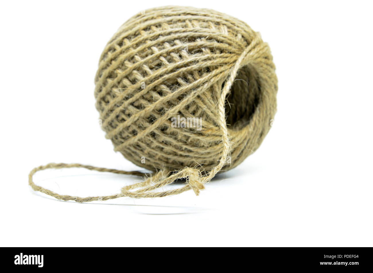 Linen string isolated on a white background Stock Photo - Alamy