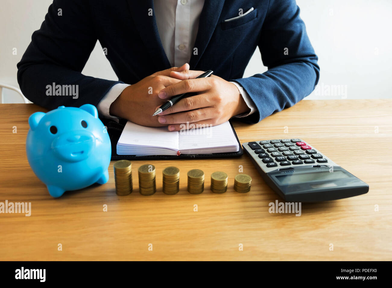 Calculate invest hi-res stock photography and images - Alamy