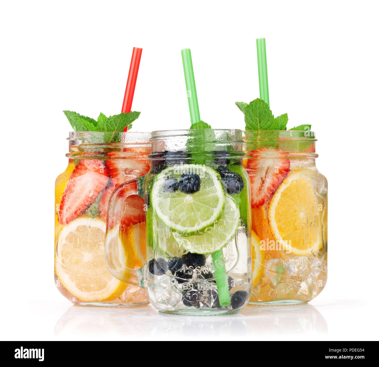 Fresh lemonade jar with summer fruits and berries. Isolated on white ...