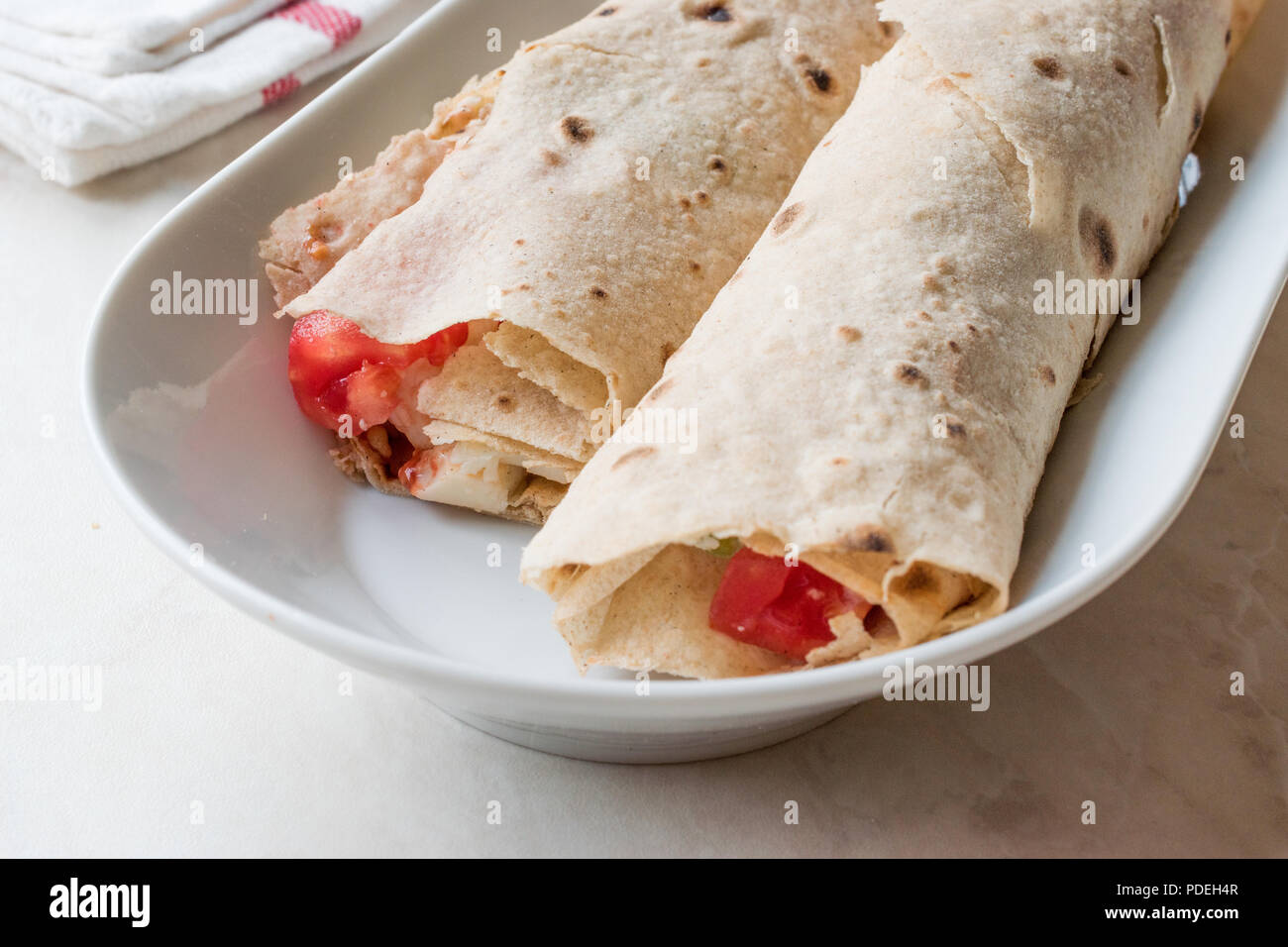 Turkish Fast Food Wrap Gozleme with Tomatoes and Cheese. Traditional ...