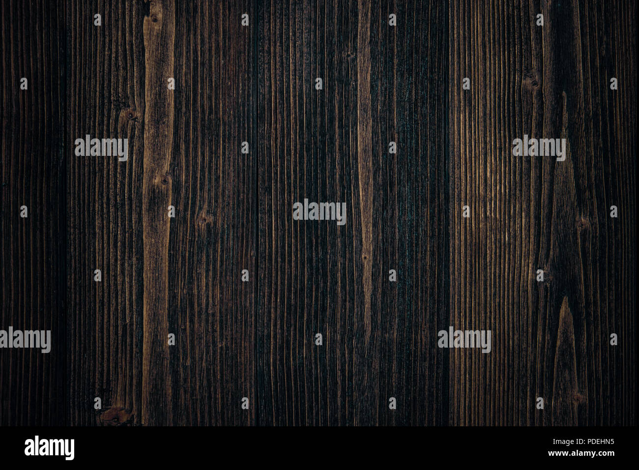 Dark brown wood texture with natural striped pattern for background ...