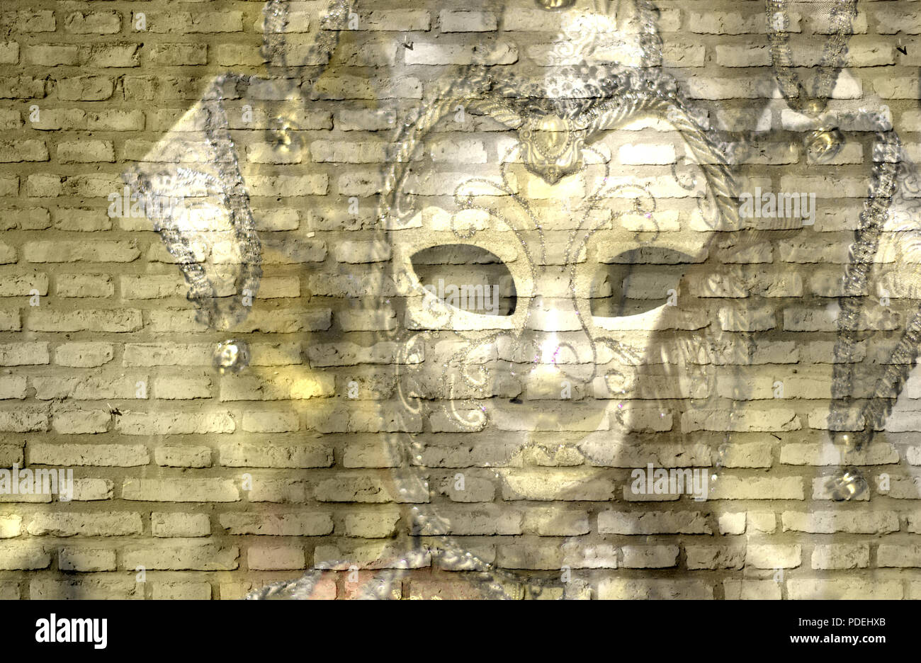 the mask appears from behind the wall Stock Photo - Alamy