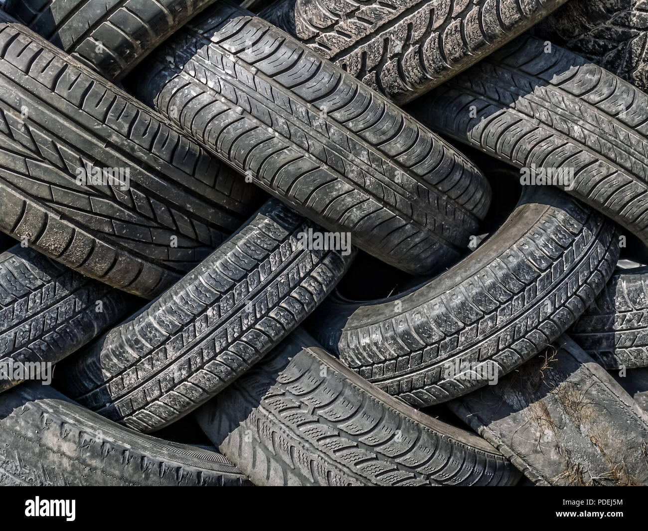 Piles of used and worn car tires Stock Photo - Alamy