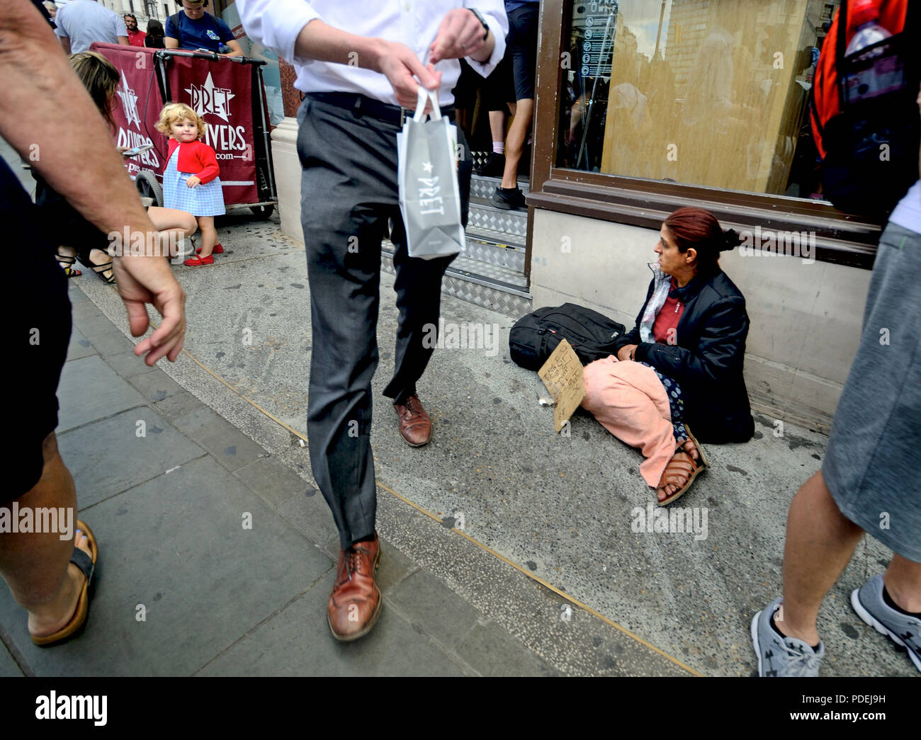 Homeless woman begging hi-res stock photography and images - Alamy
