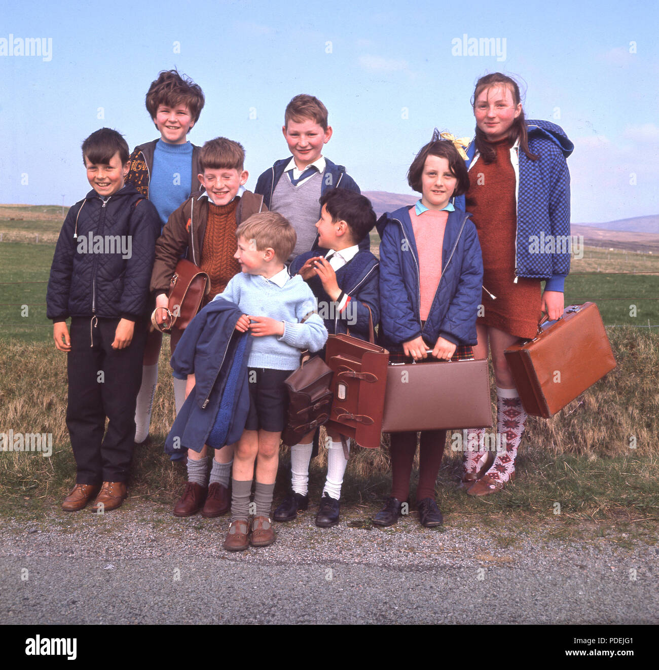 1960s, historical, group of excited school children together on their ...