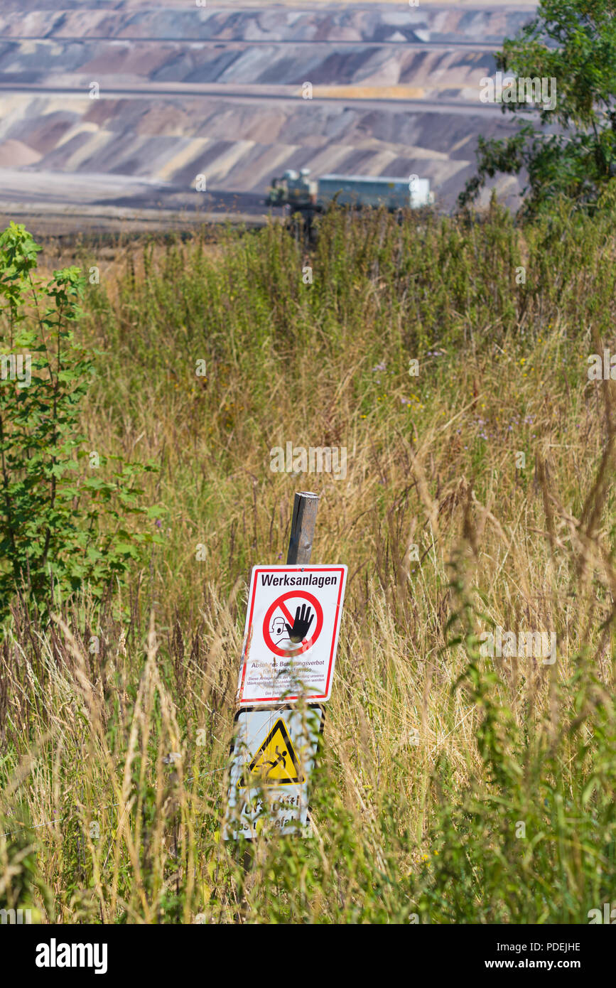 Warning sign excavator hi-res stock photography and images - Alamy