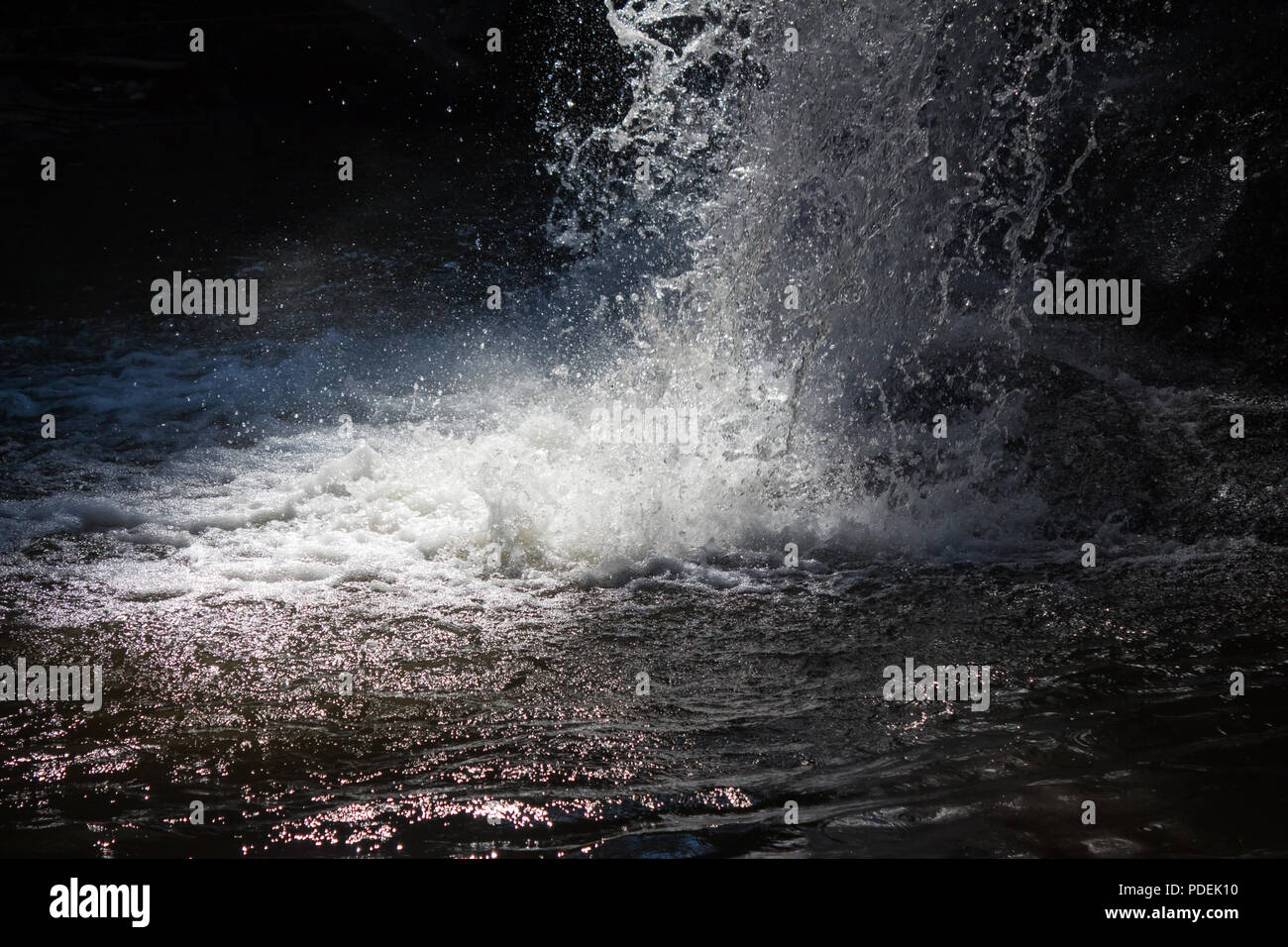 Waterfall stream. Black and white water spray Stock Photo - Alamy