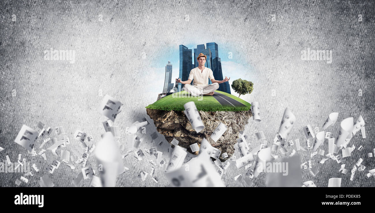 Young man keeping mind conscious Stock Photo - Alamy