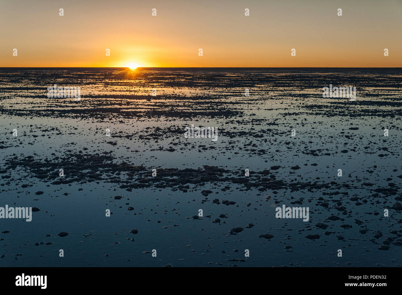 Sunset in the Salar de Uyuni, near Colchani. It is the largest salt ...