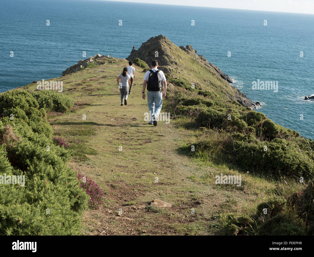 Family on a coastal walk in Cornwall Stock Photo - Alamy