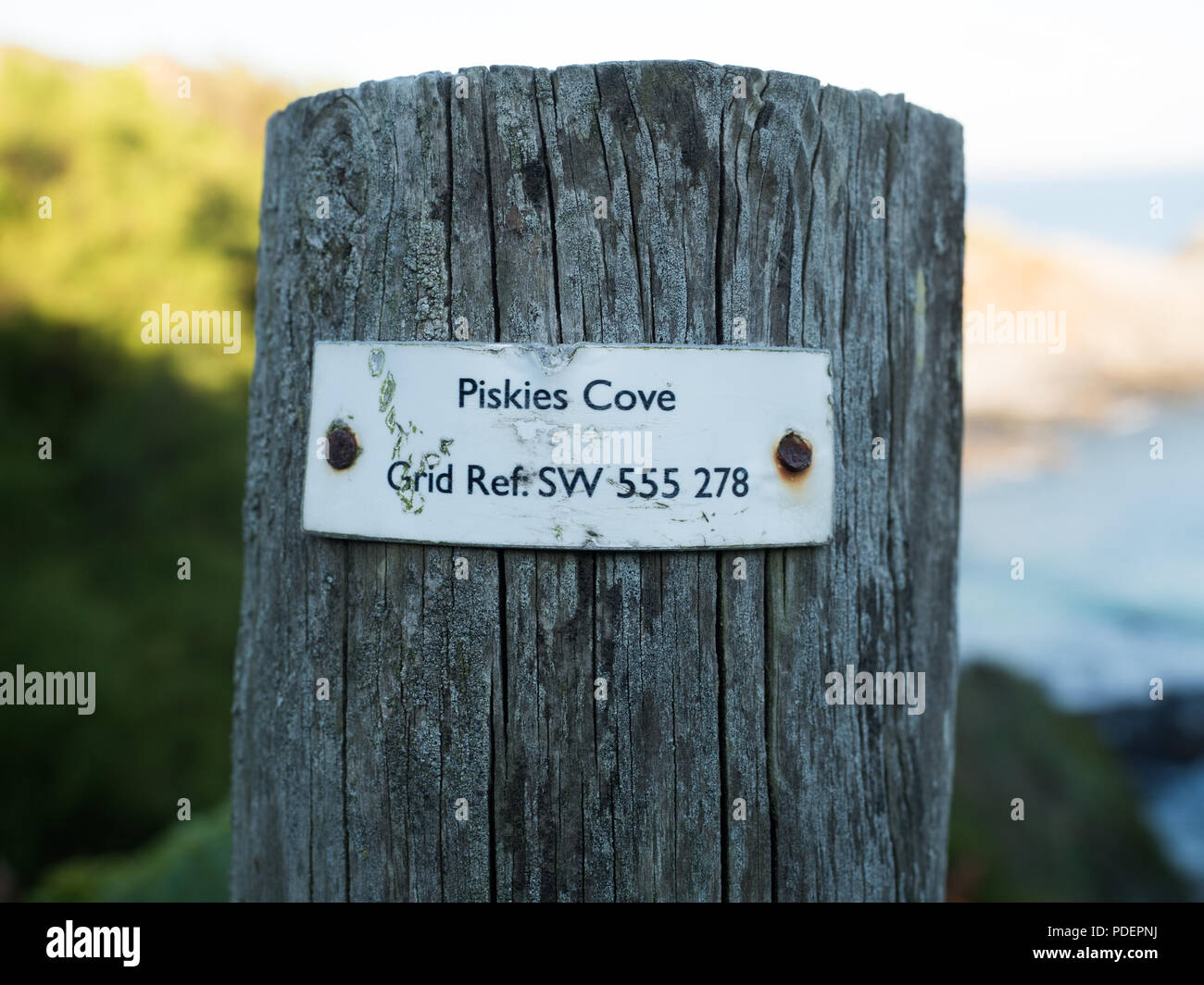 Piskies Cove grid marker Stock Photo - Alamy