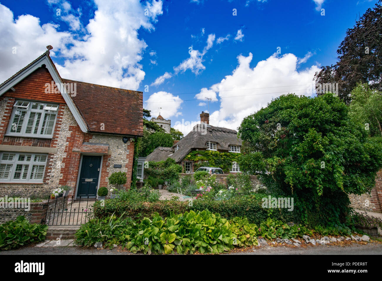 Old traditional buildings in a small English village in West Sussex ...