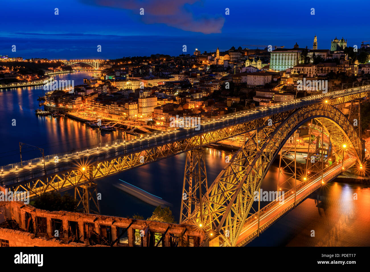 Cityscape of Porto, Portugal over Dom Luis I Bridge and Douro River at ...