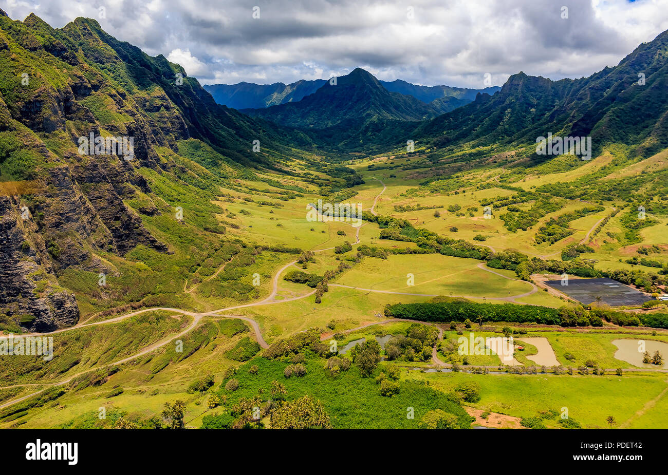 Aerial view mountain ridges and a valley in Oahu Hawaii from a ...